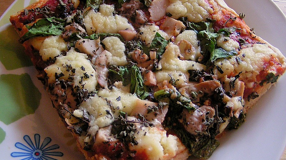 Pizza mit Fisch und Spinat